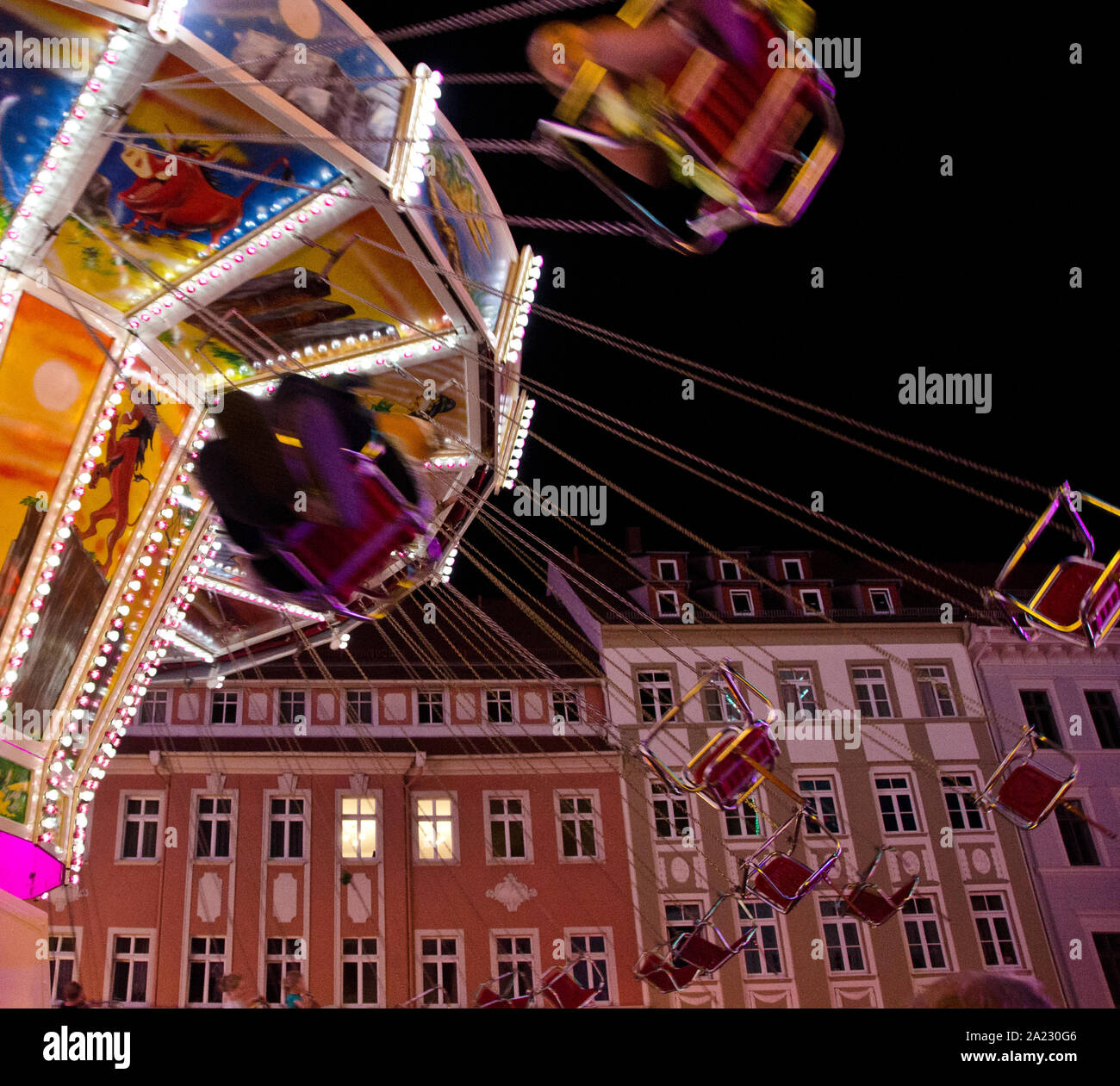 Spinning chair fun fair hi-res stock photography and images - Alamy