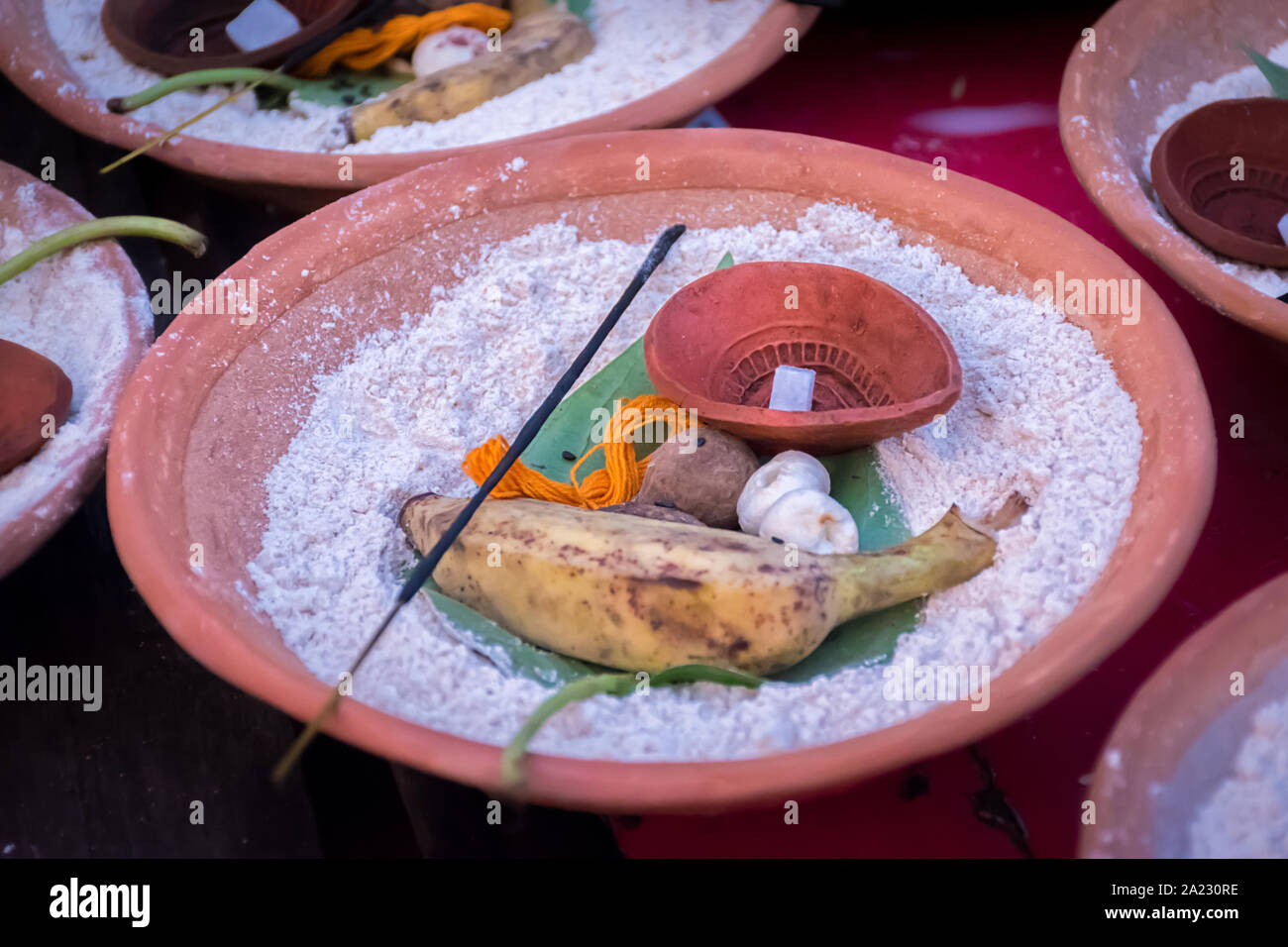 Soil malasa with rudraksha mala, Supari or betel nut, banana, pan pata ...