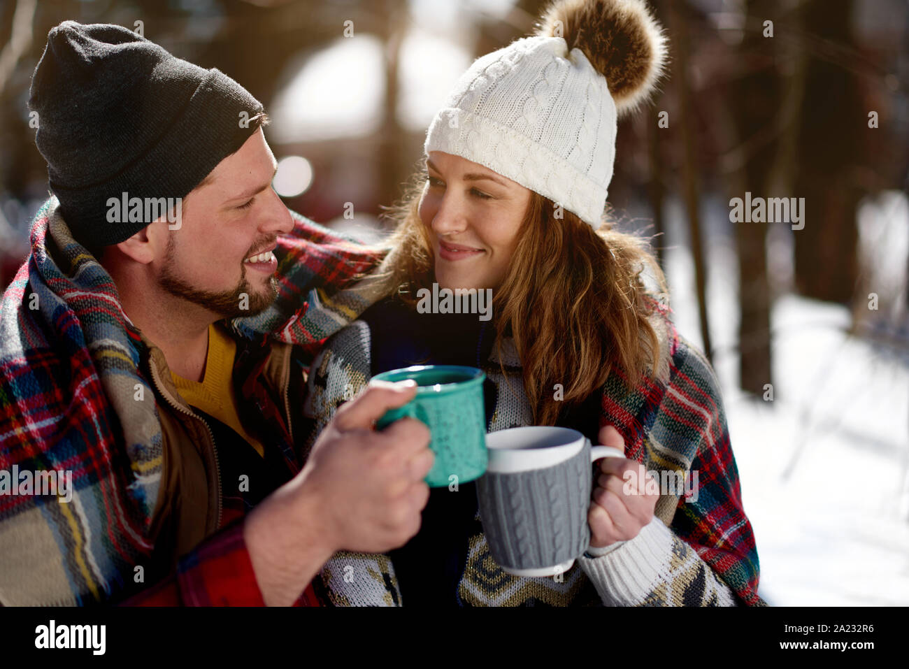 Couple cuddling blanket hi-res stock photography and images - Alamy