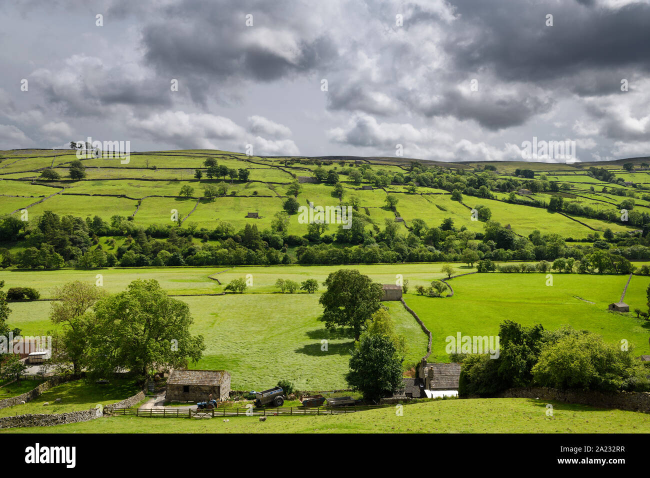 Tree lined River Swale in Swaledale near Gunnerside Yorkshire Dales ...