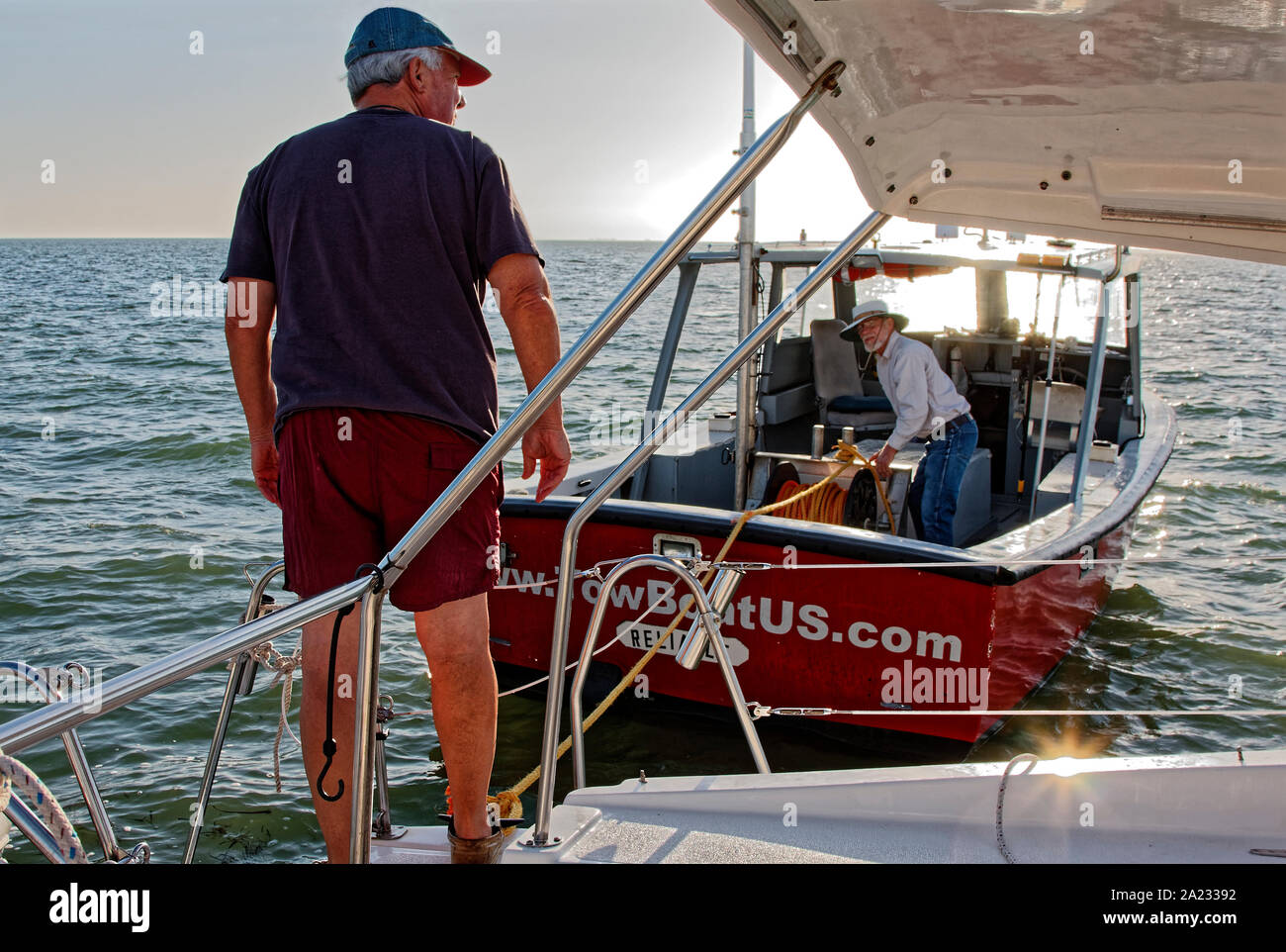Towing boat off sandbar hi-res stock photography and images - Alamy