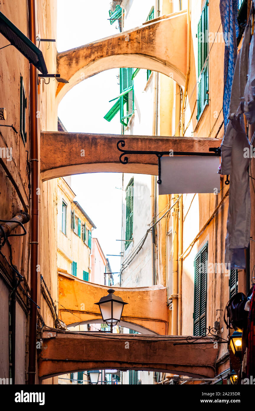 Narrow ancient medieval Old Town street full of construction arcs ...