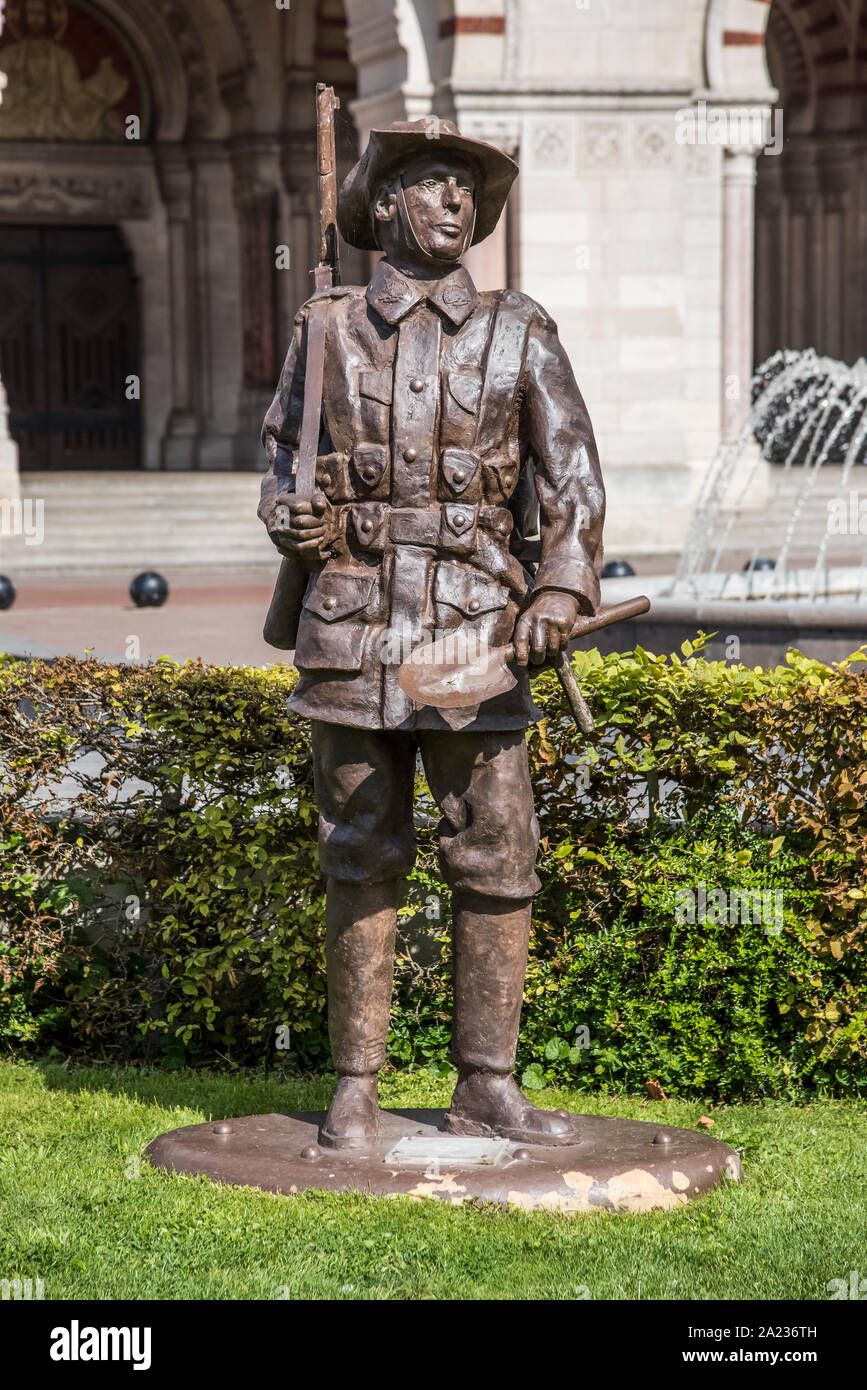 An Australia WWI Digger stands guard outside the church of the Basilica ...