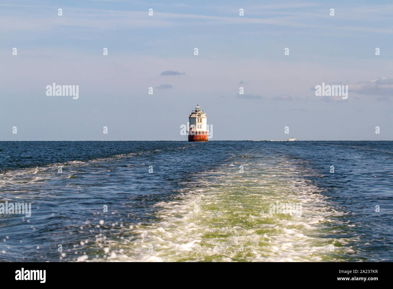 Point No Point Lighthouse in Chesapeake Bay off coastline of rural ...