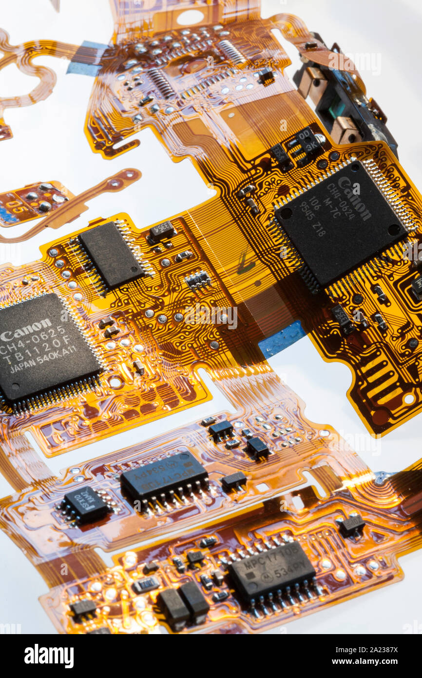 Circuit board of a Canon digital camera on white background Stock Photo ...