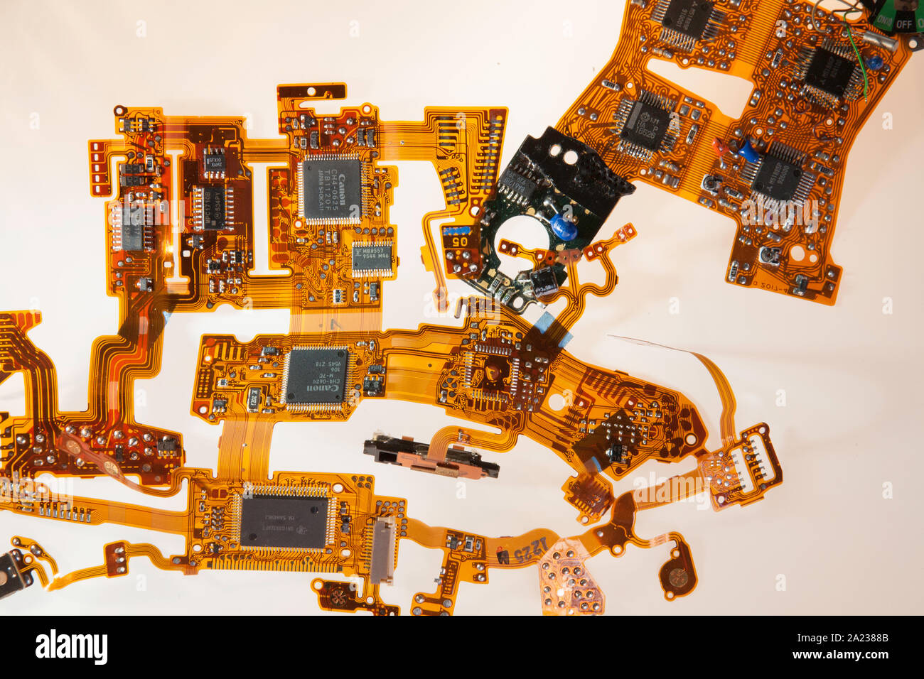 Circuit board of a Canon digital camera on white background Stock Photo ...