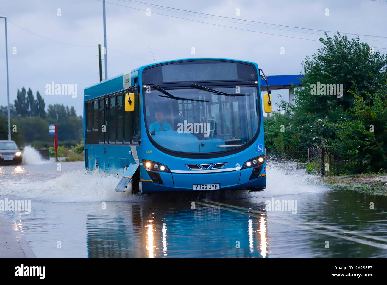 Bus in flood water hi-res stock photography and images - Alamy