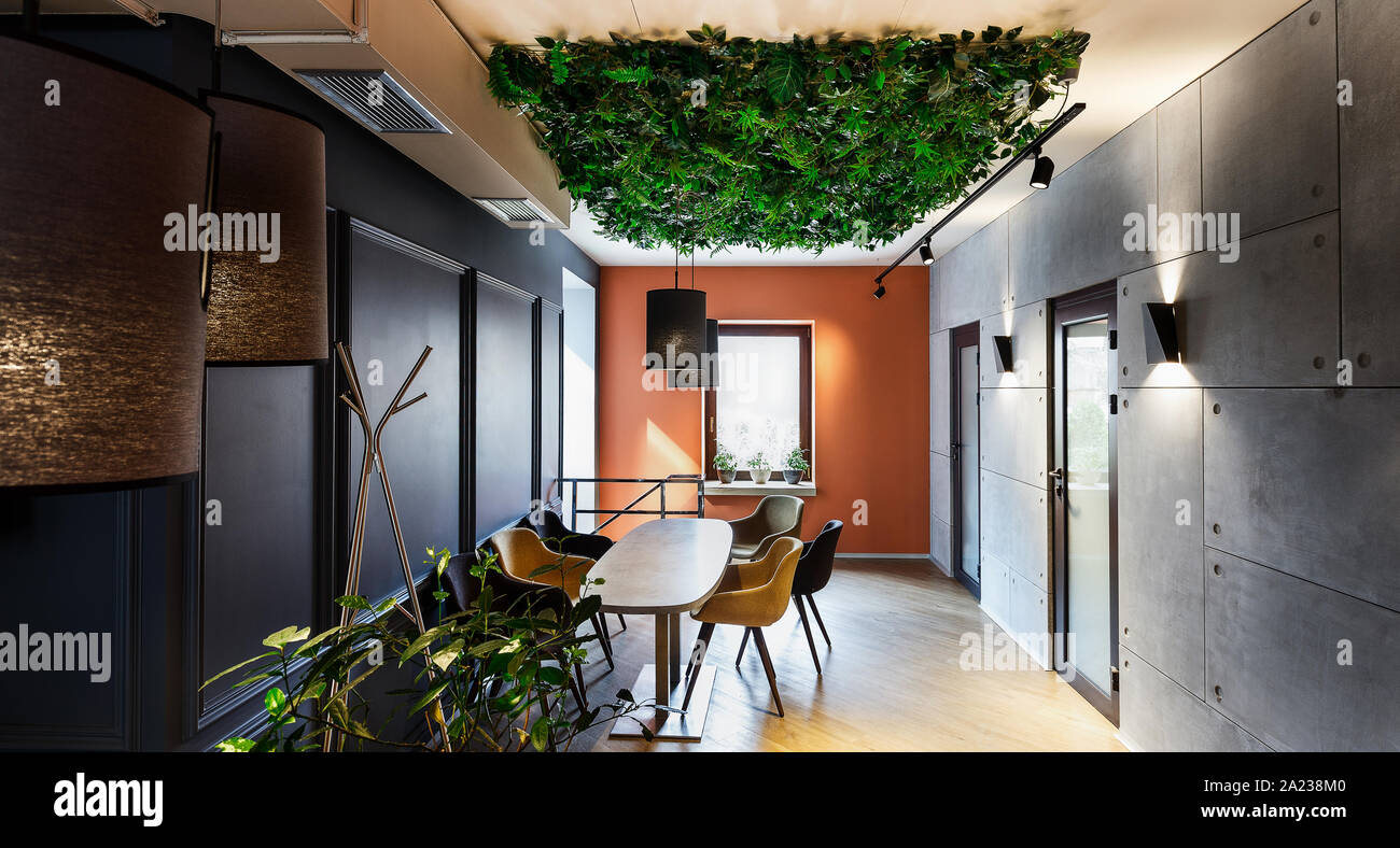 Eco architecture. Natural interior in modern cafe with plants on ...