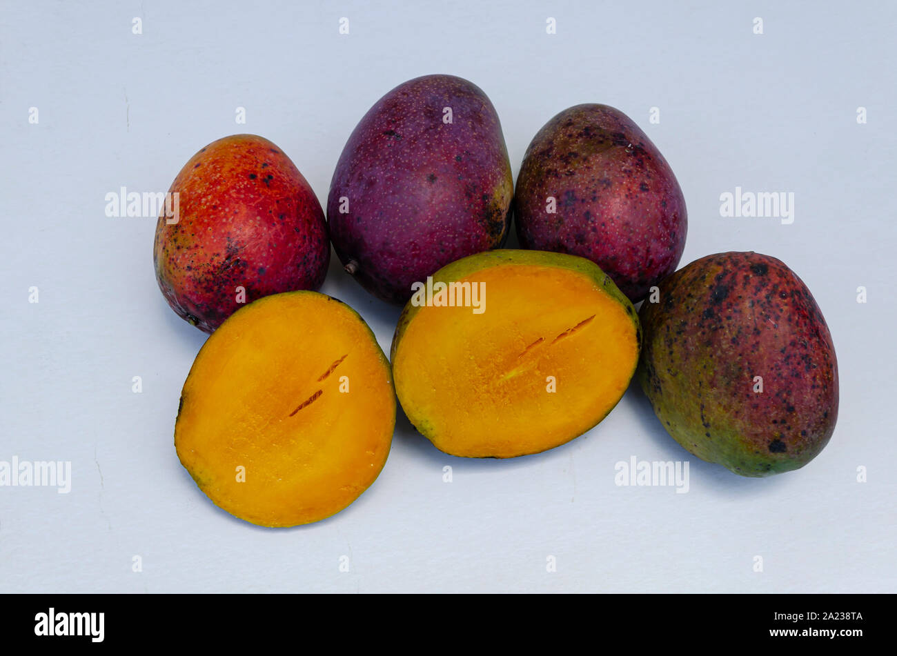 Mango Whole Fruit and Cross Sections Stock Photo - Alamy