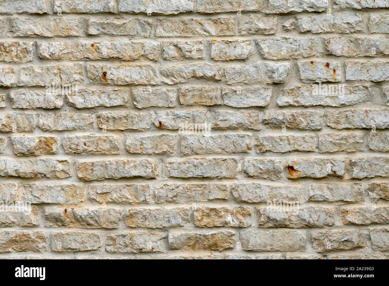 Magnificent old limestone brick wall. Can be used as background or ...