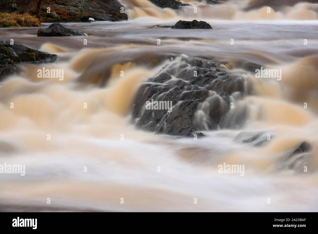 Standing waves and rushing water in the Amnicon River, Amnicon Falls State Park, Wisconsin, USA ...