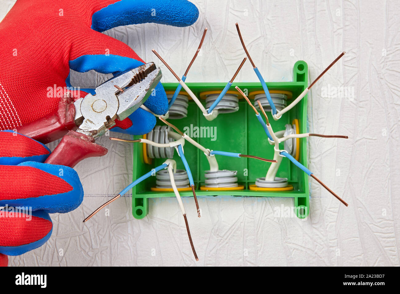 Installation of a rectangular electrical distribution box made of green ...
