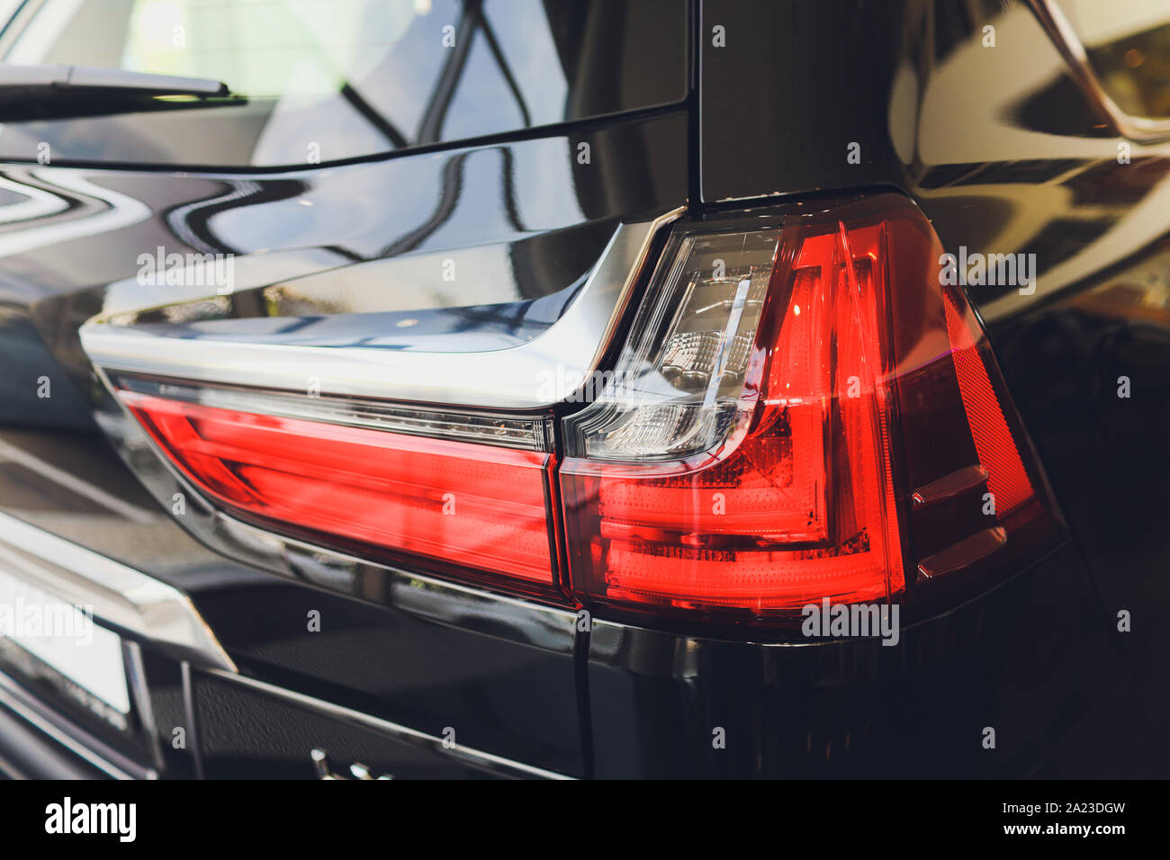 Car detail. New led taillight by night. The rear lights of the car, in ...