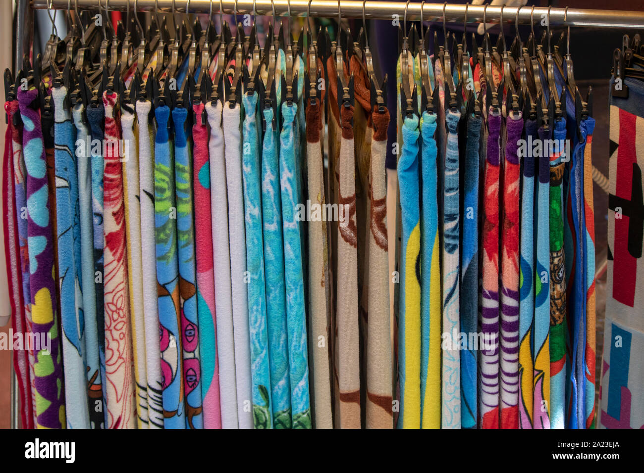shawl hangers of various colors were filmed in front of the store ...