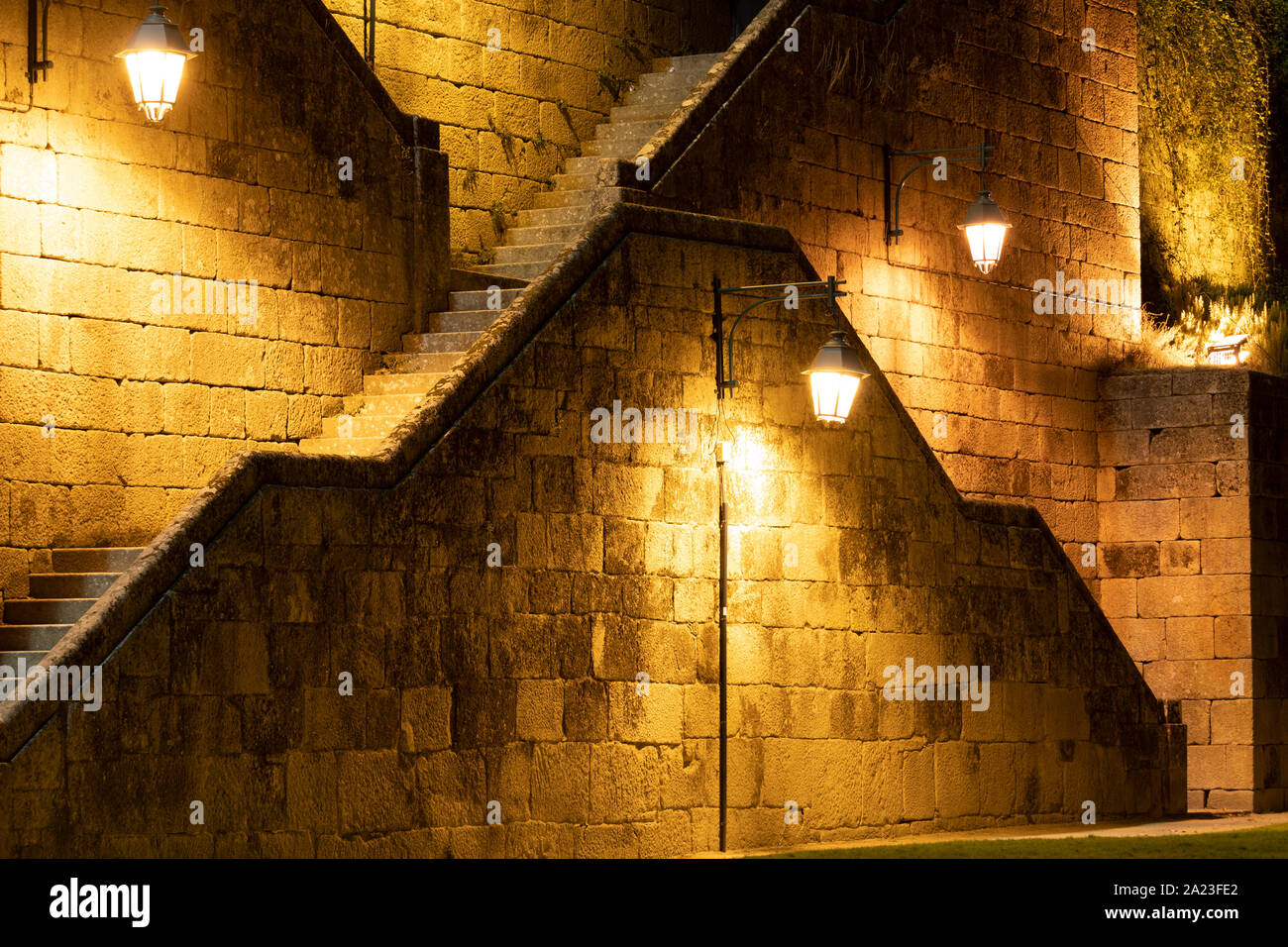 park at night with yellow lights Stock Photo - Alamy