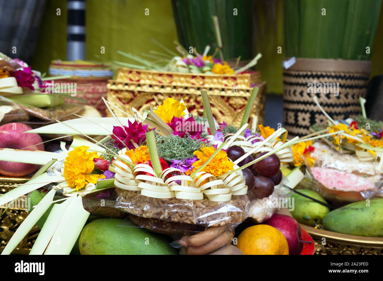 Traditional offerings to gods in Indonesia with flowers, fruits and ...