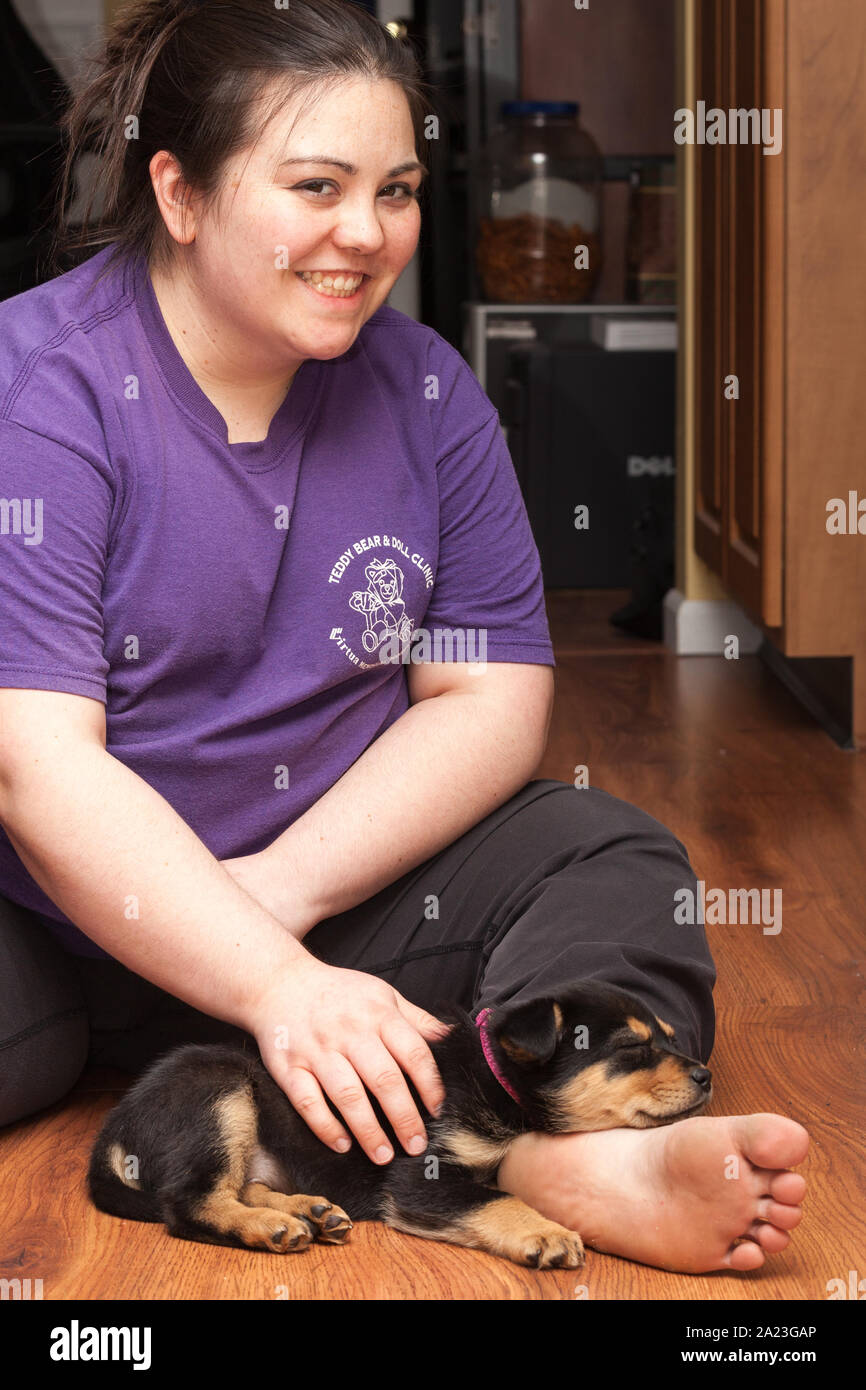 Young adopted rescue puppy acclimating to new "fur-ever" home and ...