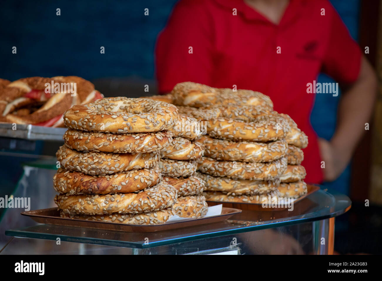 Various cores lined pretzels on bench. Blurred background of running ...