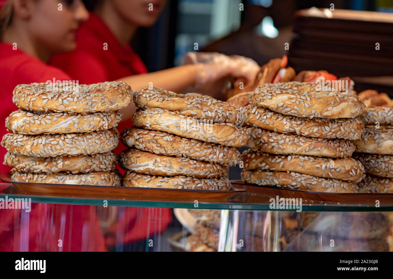Various cores lined pretzels on bench. Blurred background of running ...
