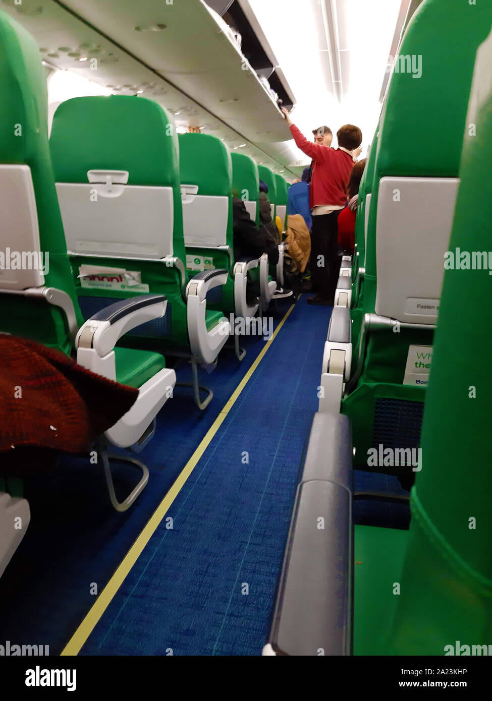 european train journey, vertical photo cutting. green seats and ...
