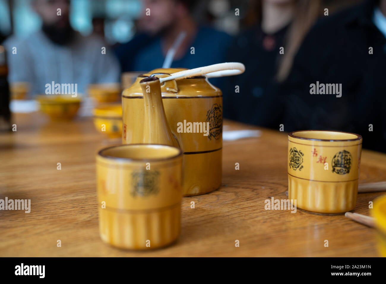 Tea in a Chinese yellow pot and glasses Stock Photo - Alamy