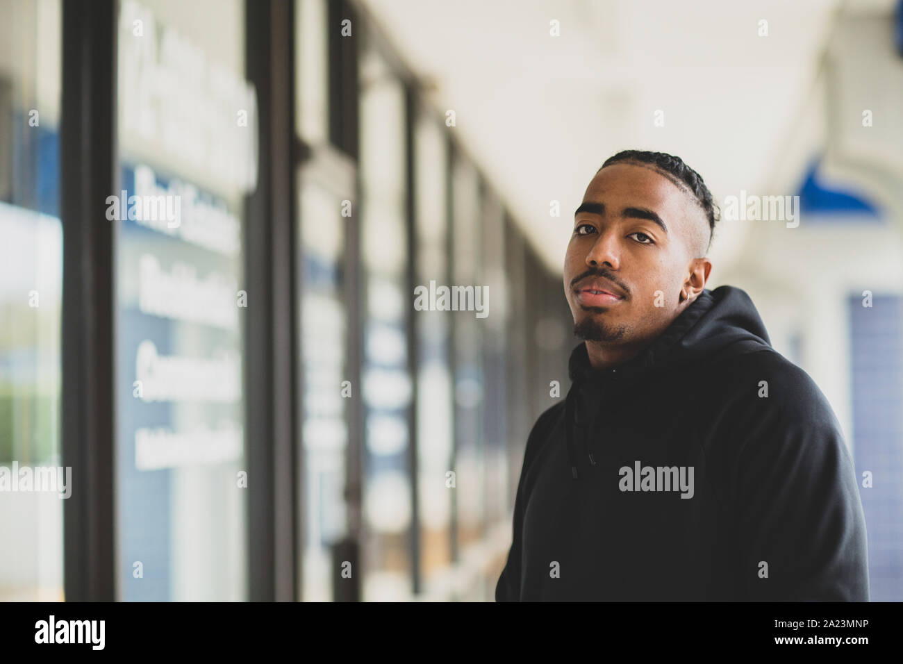 Man wearing hoddie hi-res stock photography and images - Alamy