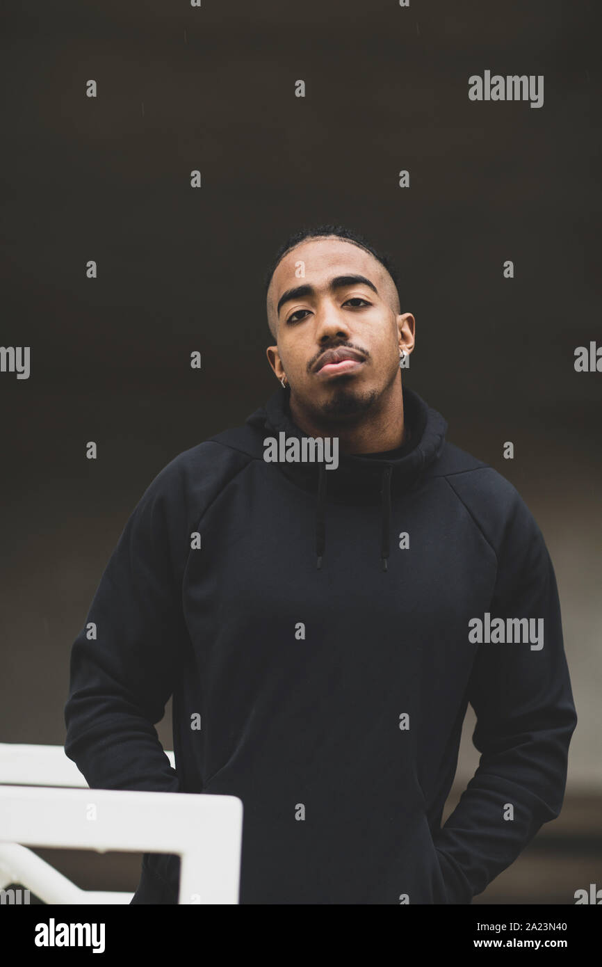 Man wearing hoddie hi-res stock photography and images - Alamy