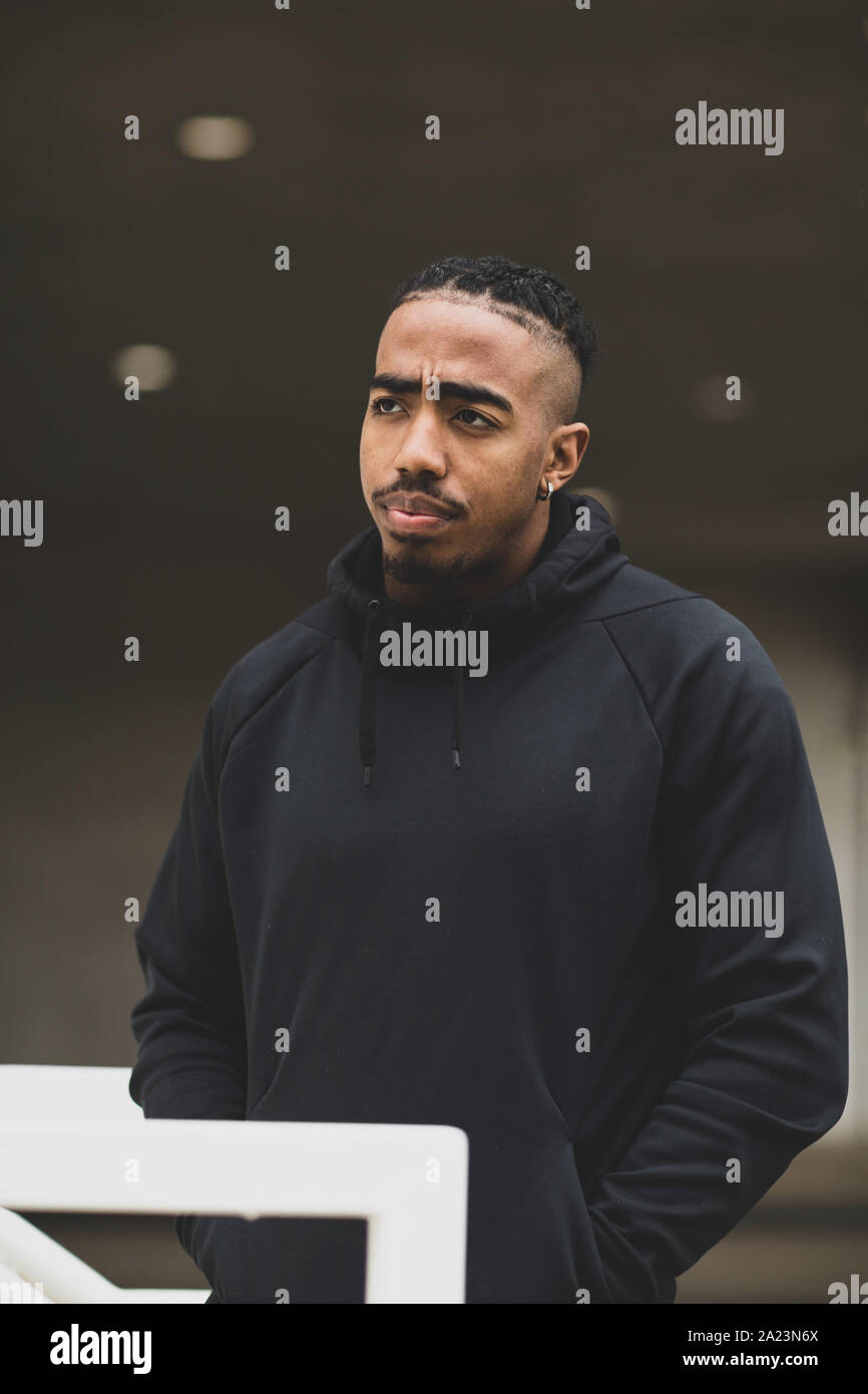Man wearing hoddie hi-res stock photography and images - Alamy