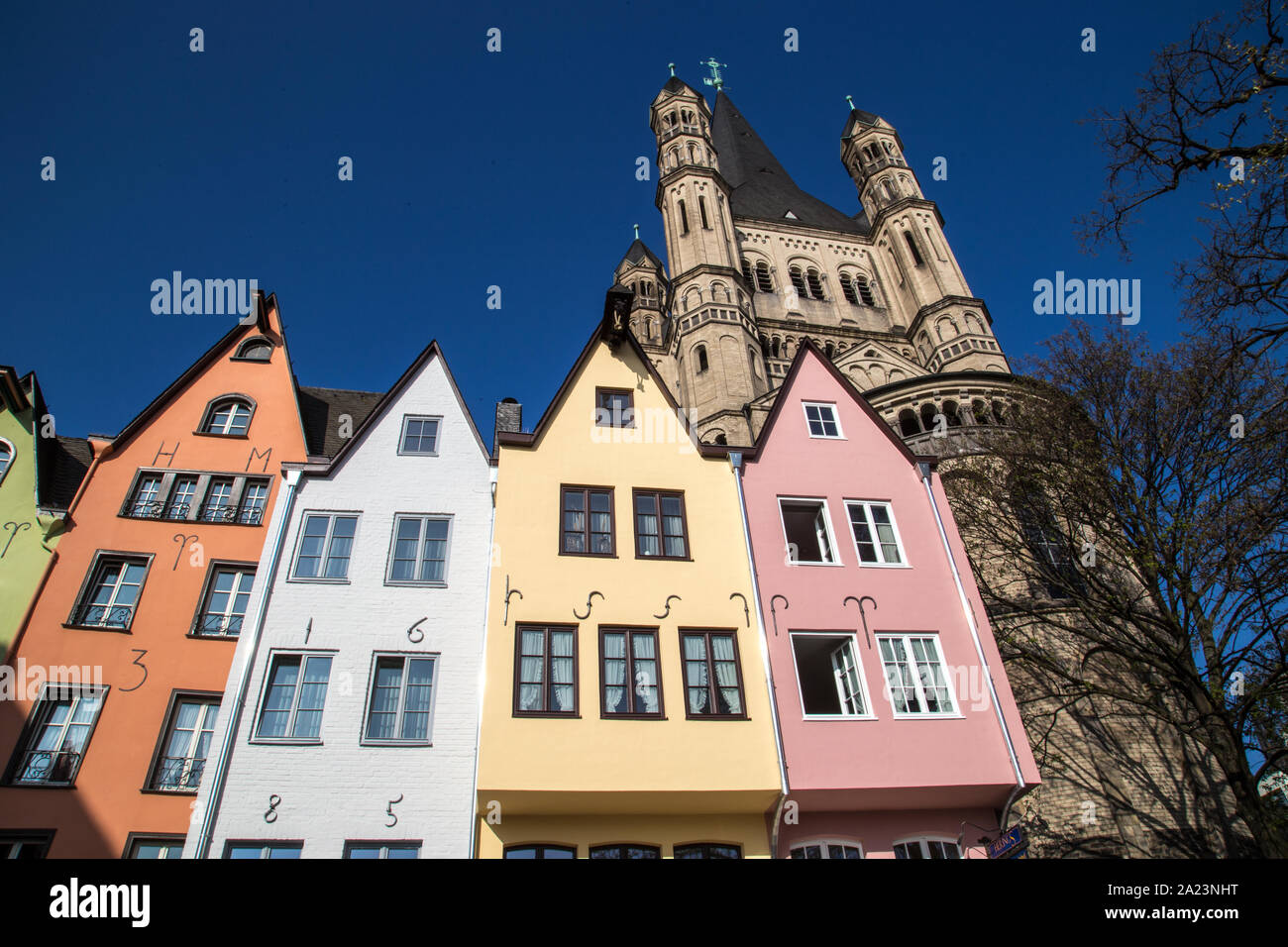 Colorful Old Town homes and Great St. Martin church in Cologne, Germany ...