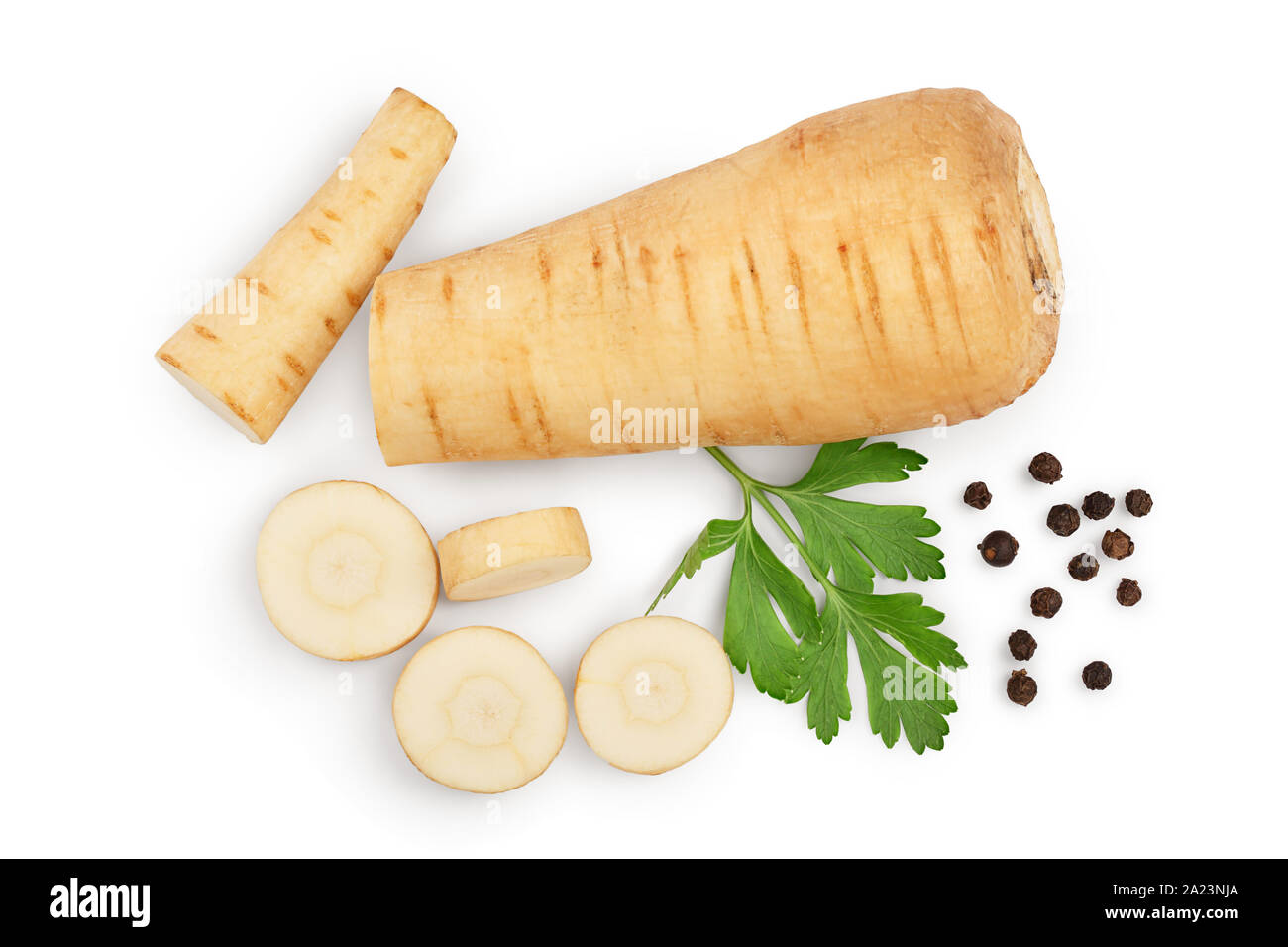 Parsnip root and slices with parsley peppercorns isolated on white ...