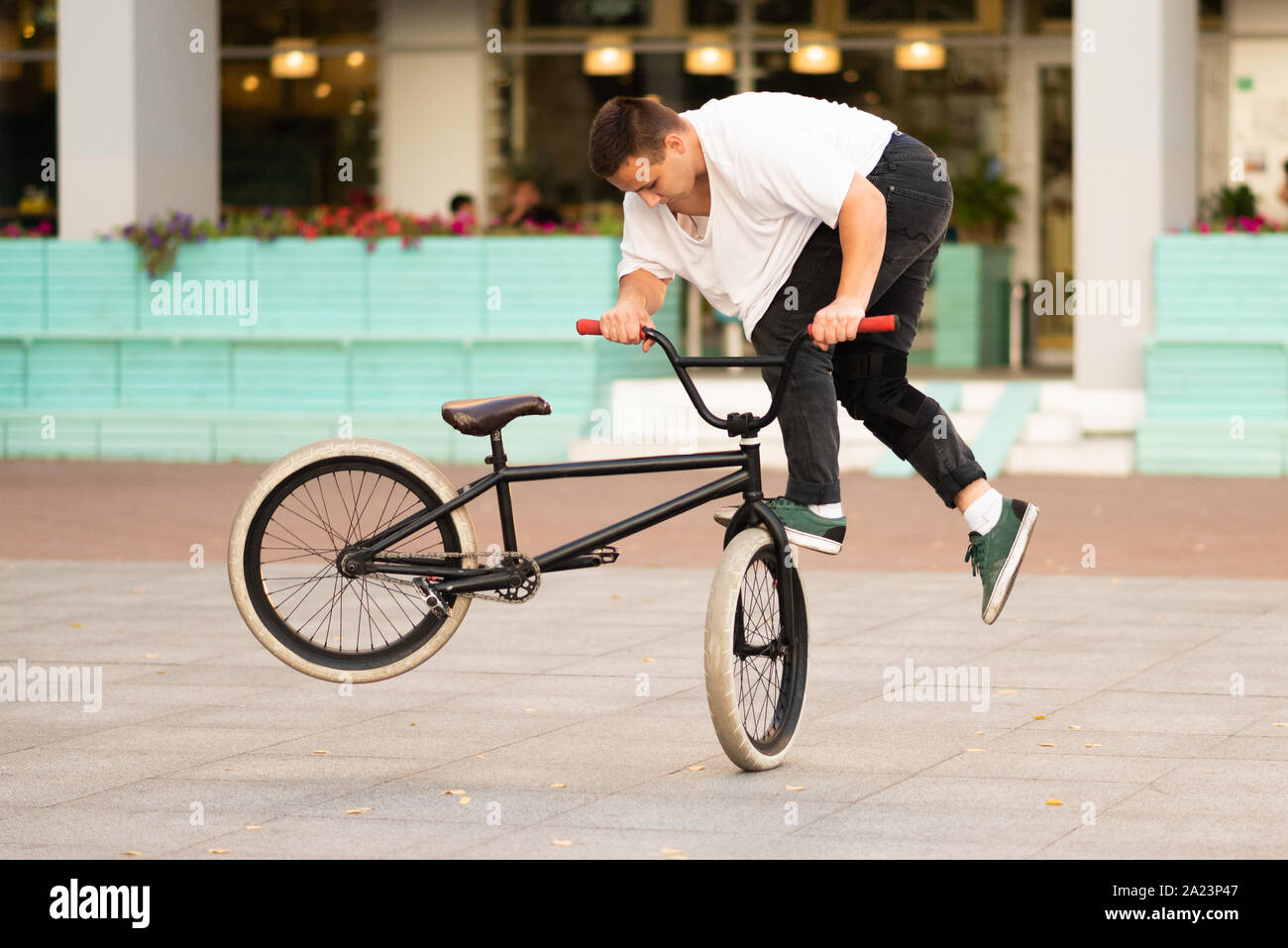 The guy on the stunt bike does the twist of the wheel and does the ...