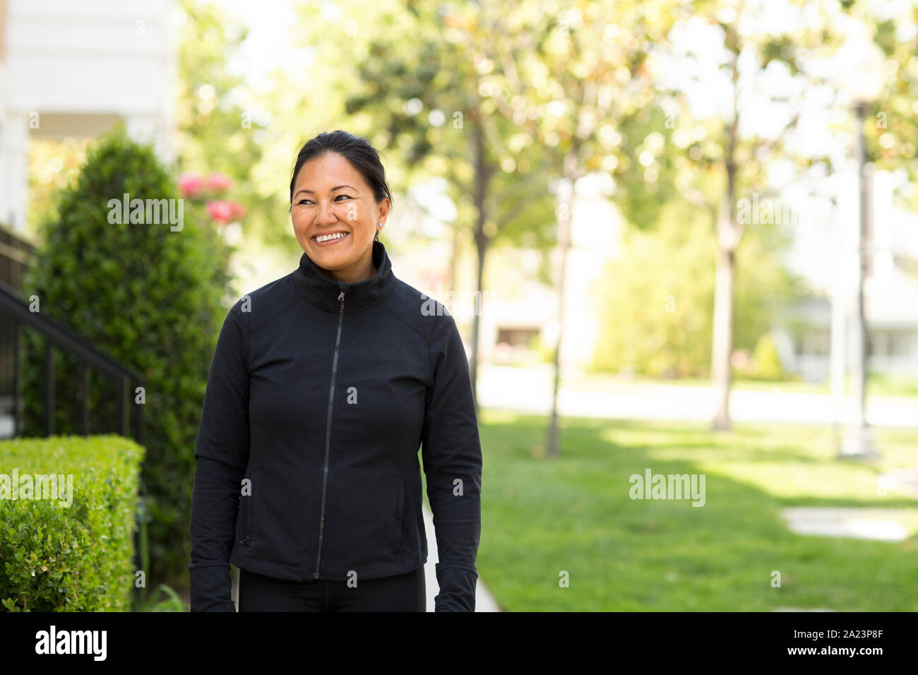 Portrait of a fit Asian woman exercising Stock Photo - Alamy