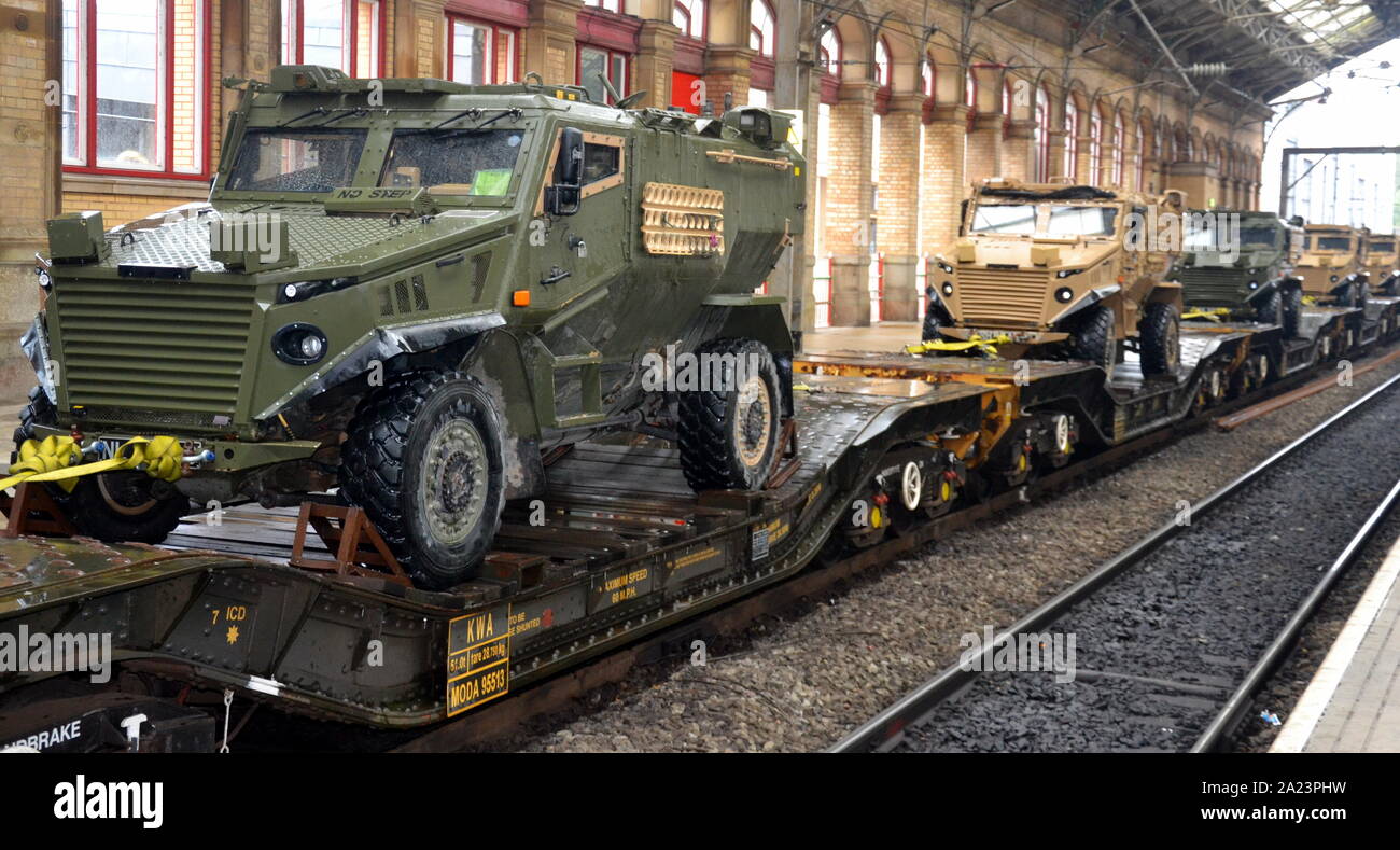 Armoured cars on a cargo train at Preston railway station, Lancashire ...