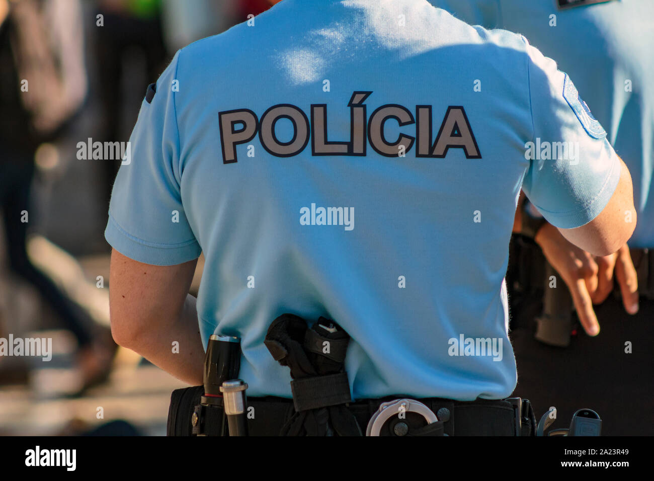 Police officer on duty on city centre Stock Photo - Alamy