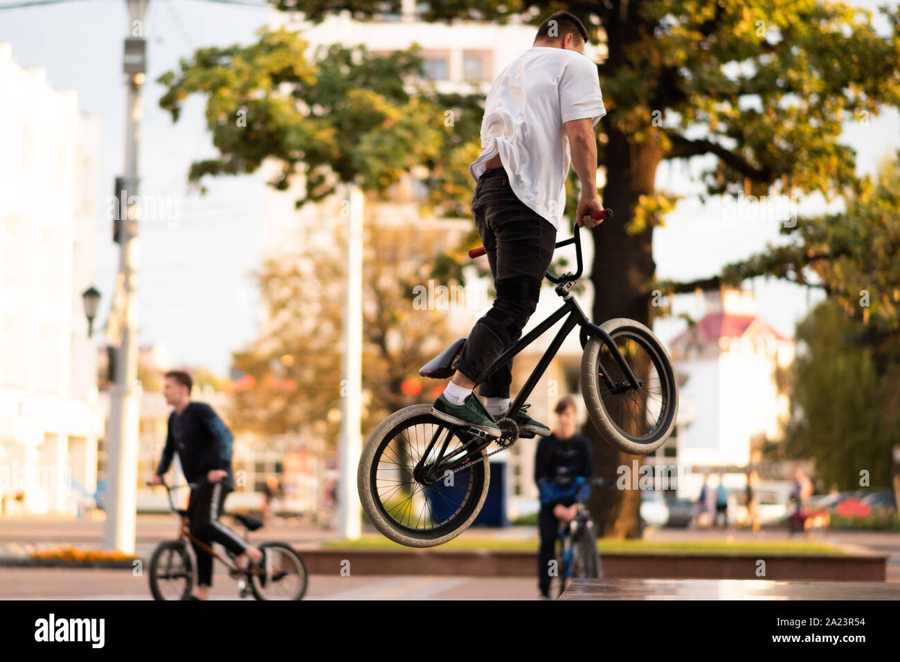 The guy performs a stunt on BMX, jumping up Stock Photo - Alamy