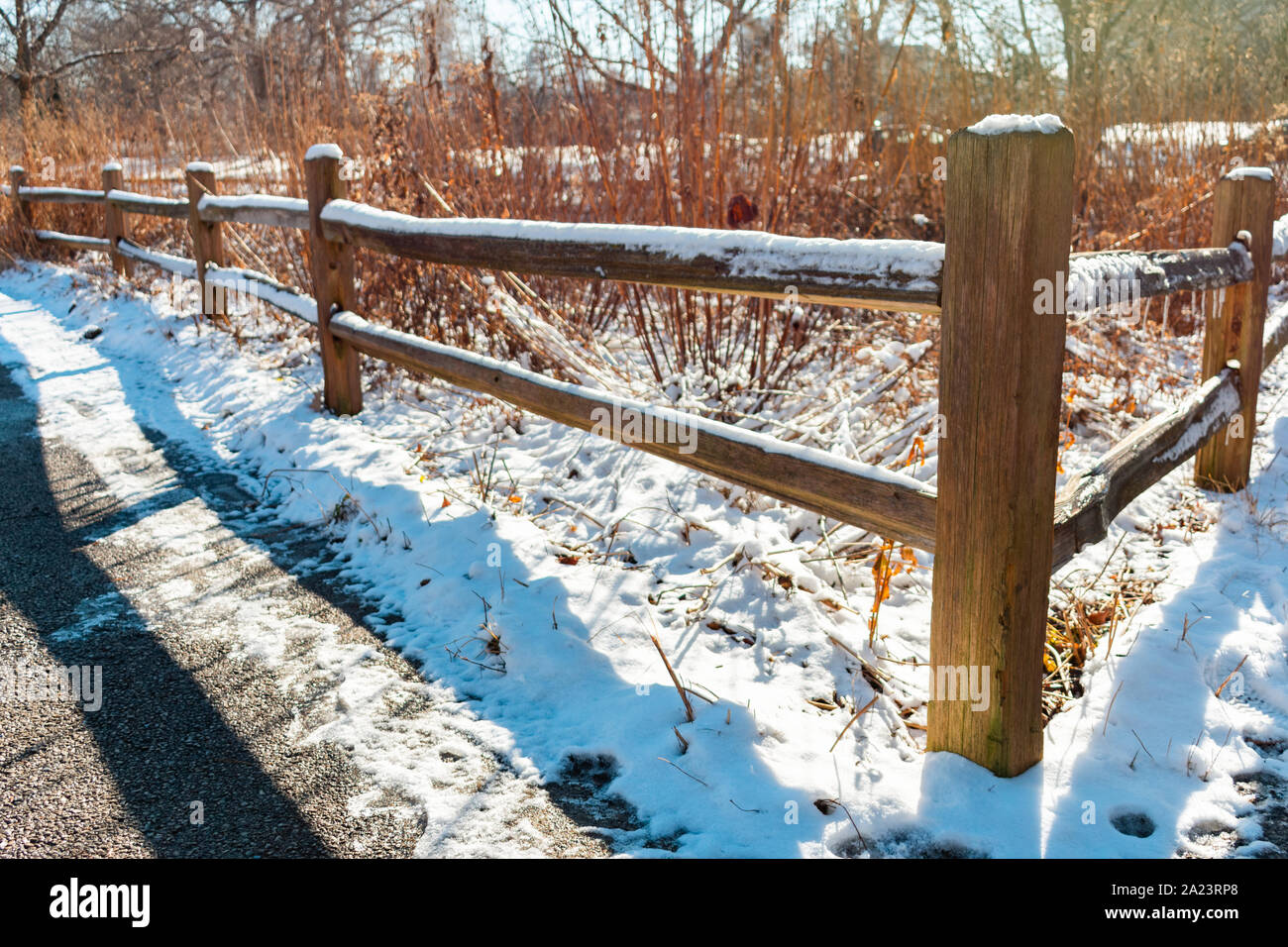 Freshly Fallen Snow on a Wood Fence Stock Photo - Alamy