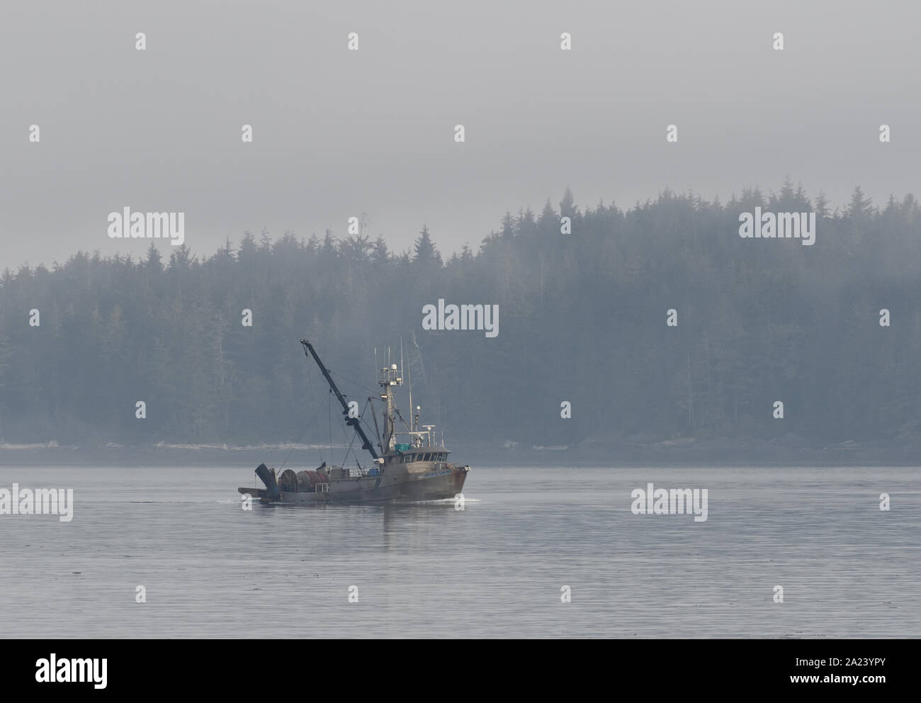 Misty morning fishing boat hi-res stock photography and images - Alamy