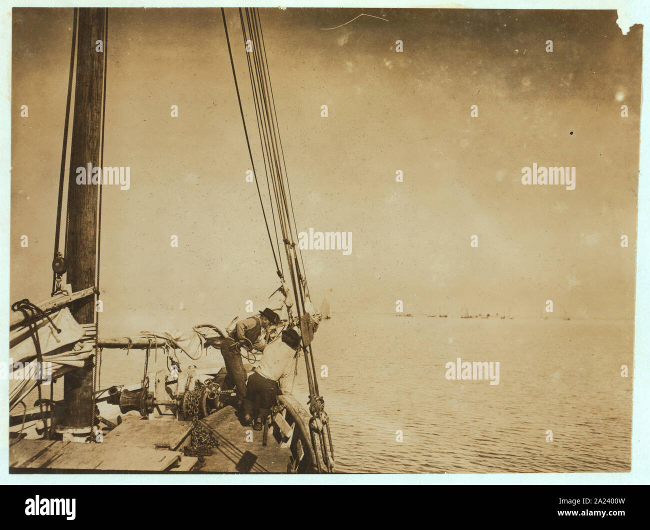 Oyster barge nearing the fleet fishing on the reefs Stock Photo - Alamy