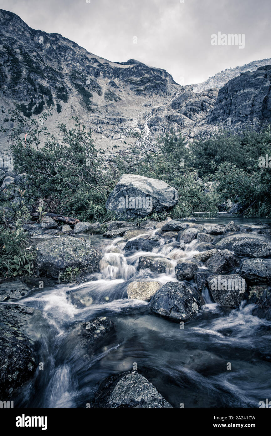 Water streaming from Matier glacier melt in Joffre Lakes Provincial ...