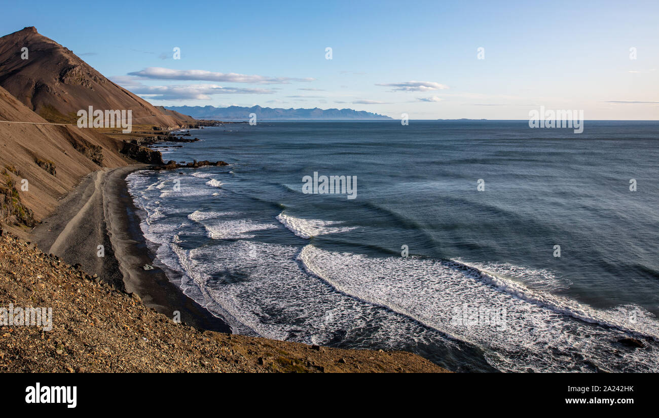 Tourist in the Red Chair in southern Iceland Stock Photo - Alamy