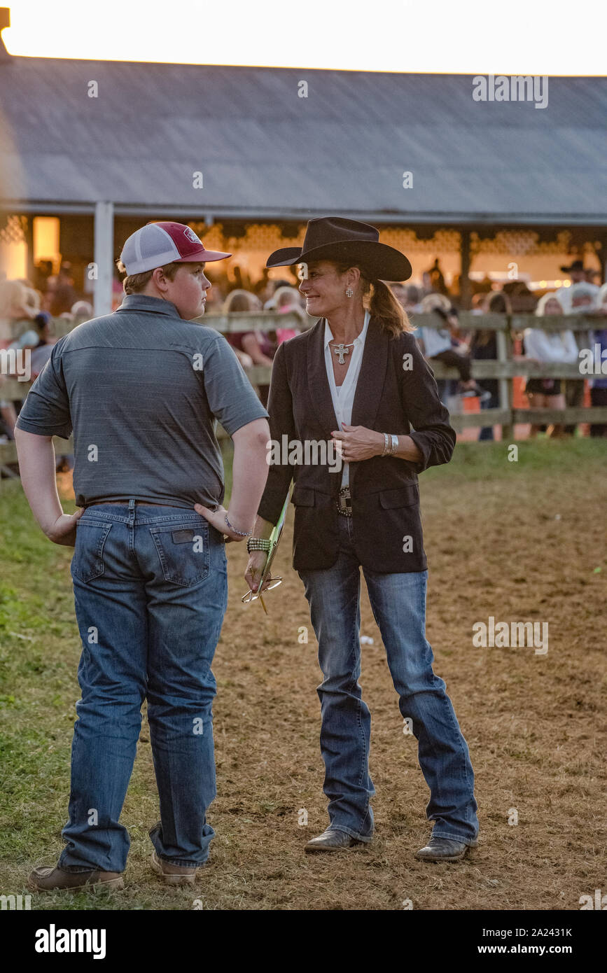 Country fair calf roping contest Stock Photo - Alamy