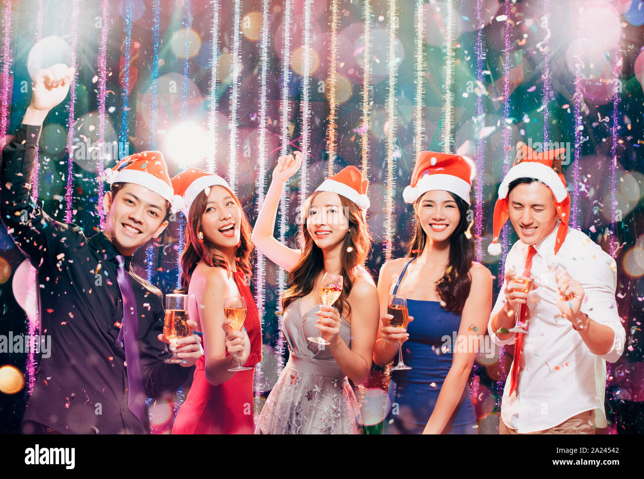 happy young group having fun in christmas party Stock Photo - Alamy