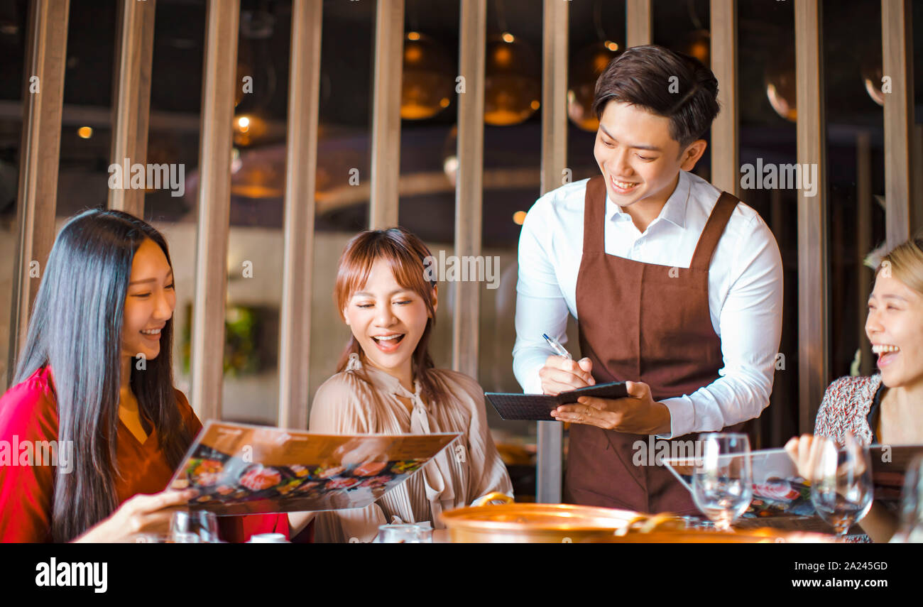 Taking food order hi-res stock photography and images - Alamy