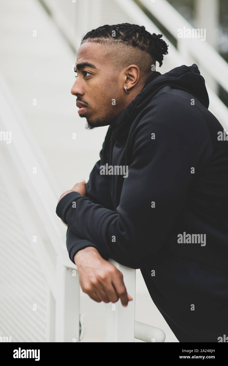 Man wearing hoddie hi-res stock photography and images - Alamy