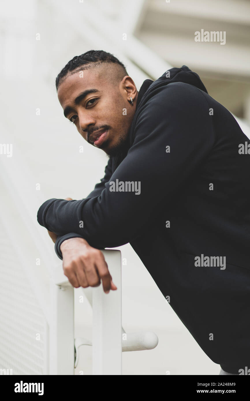 Man wearing hoddie hi-res stock photography and images - Alamy