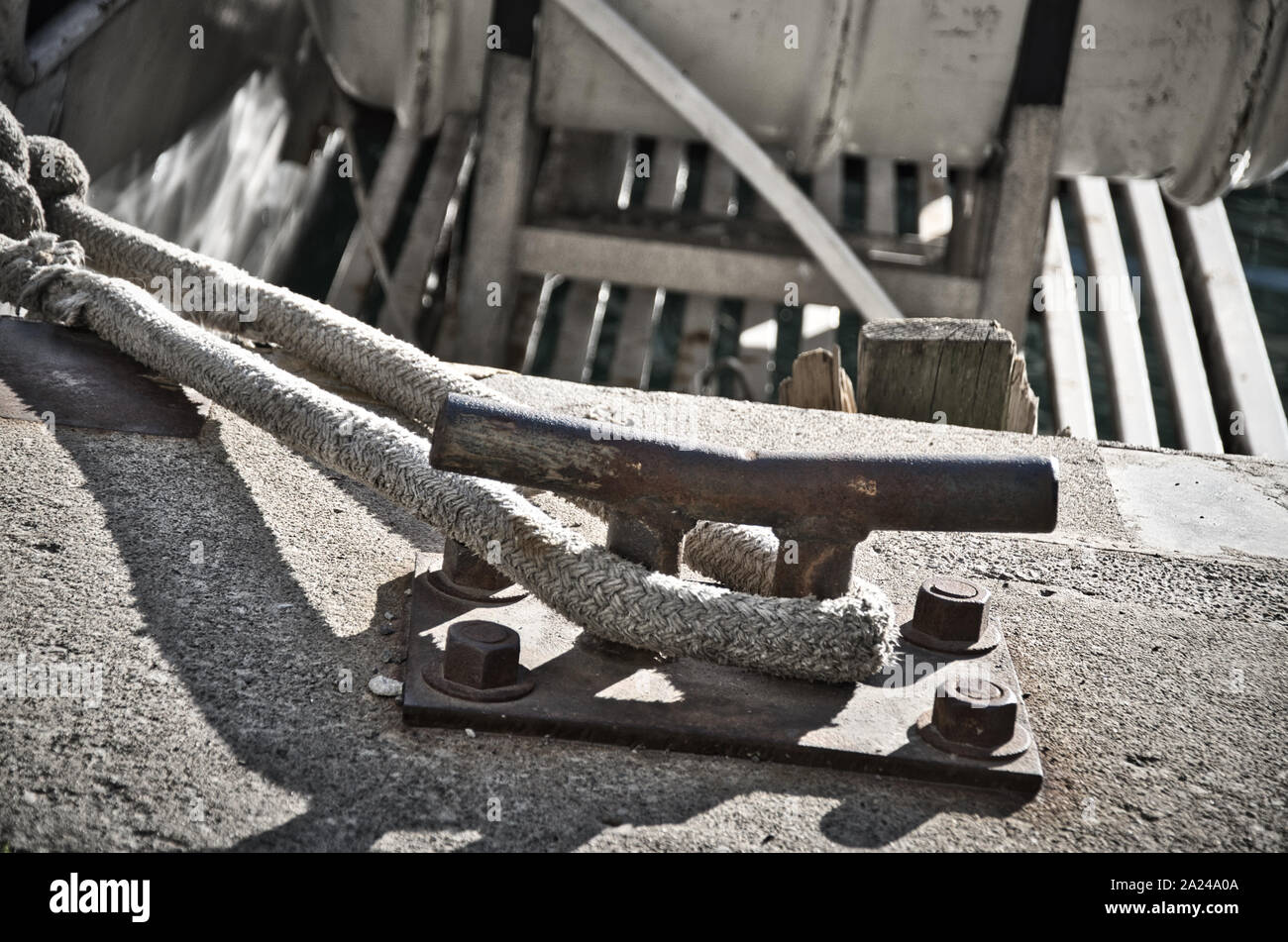 Close-up of rope tied around an anchor on shore Stock Photo - Alamy