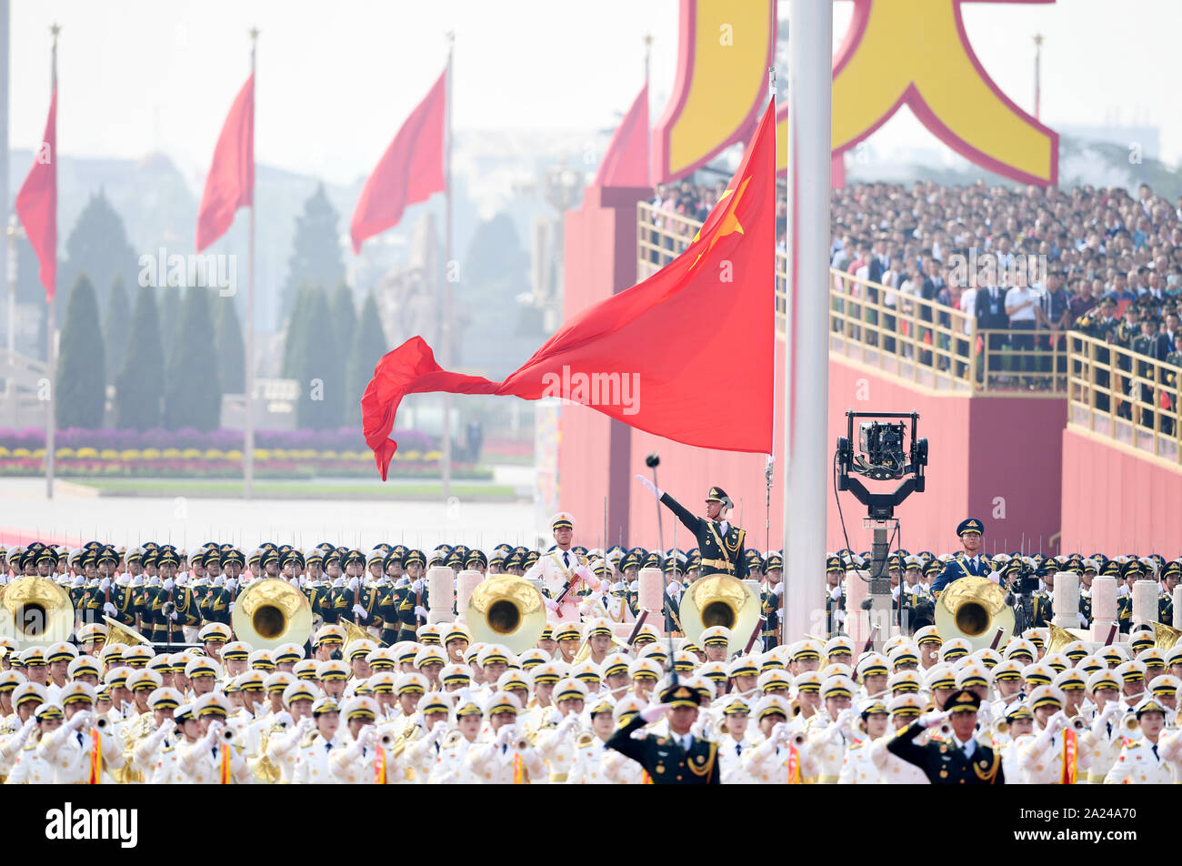 Beijing, China. 1st Oct, 2019. A flag-raising ceremony is held in ...