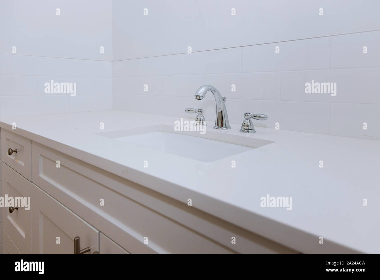 Bathroom elegant interior with sink and faucet Stock Photo - Alamy