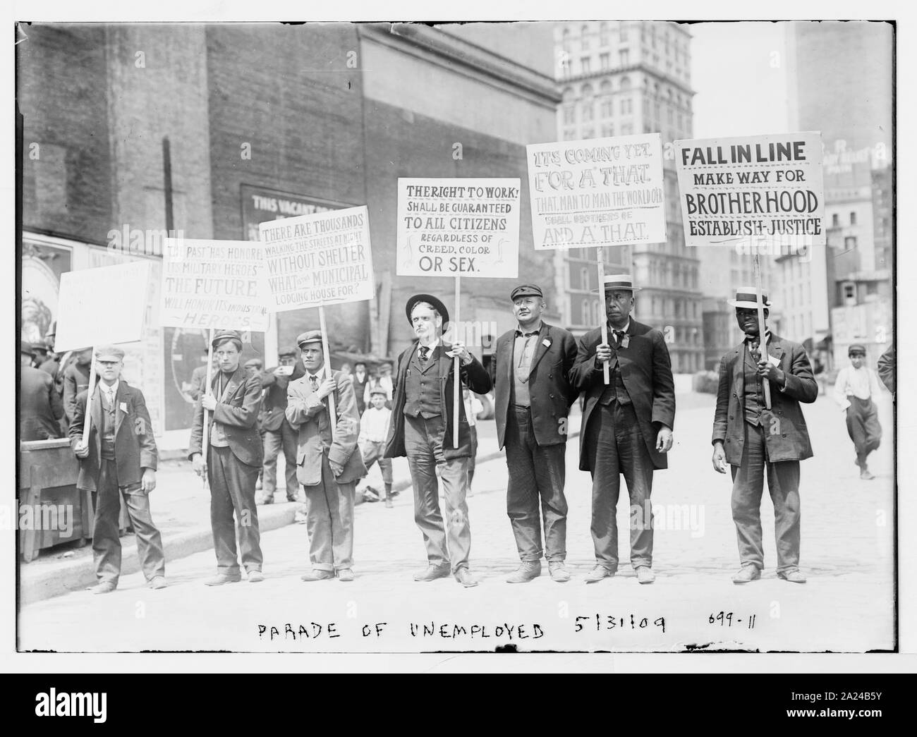 Parade of unemployed men, carrying signs, New York Stock Photo - Alamy