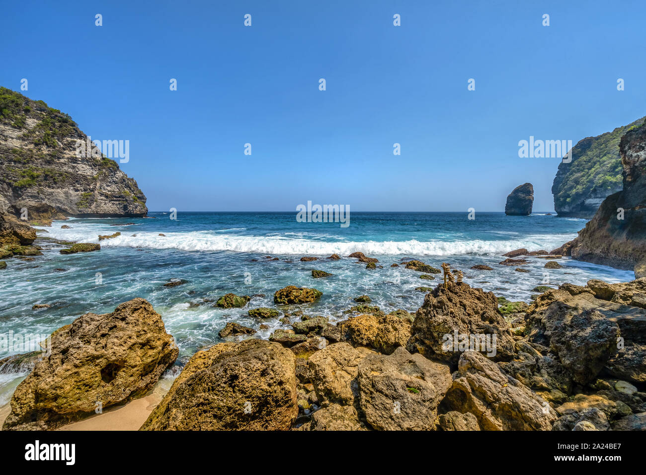 Beach and cave at Tembeling beach, at Nusa Penida Island, Bali ...